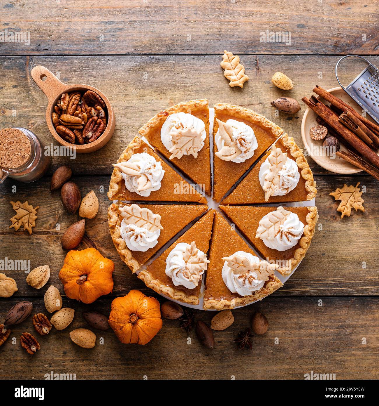 Traditional Thanksgiving pumpkin pie cut into slices Stock Photo - Alamy