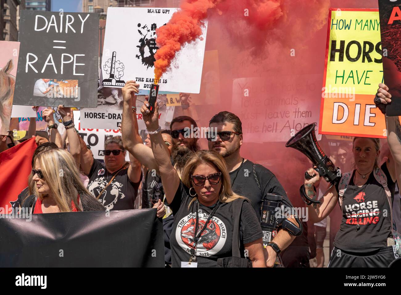 NEW YORK, NY - AUGUST 27, 2022: Rachel Ejsmont holds a smoke flare ...