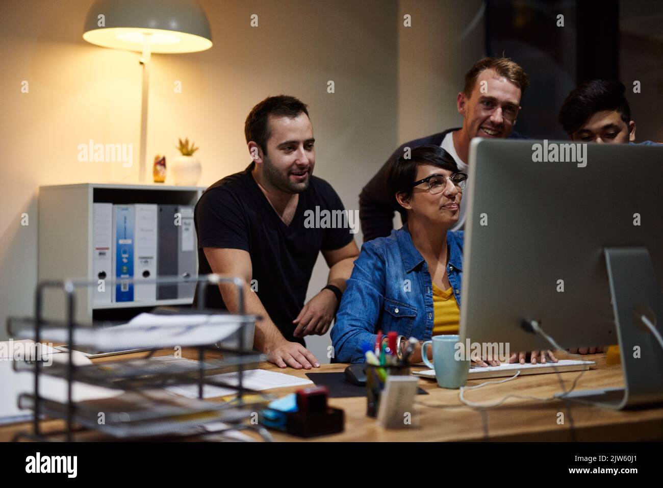 Male employees working together in hi-res stock photography and images ...