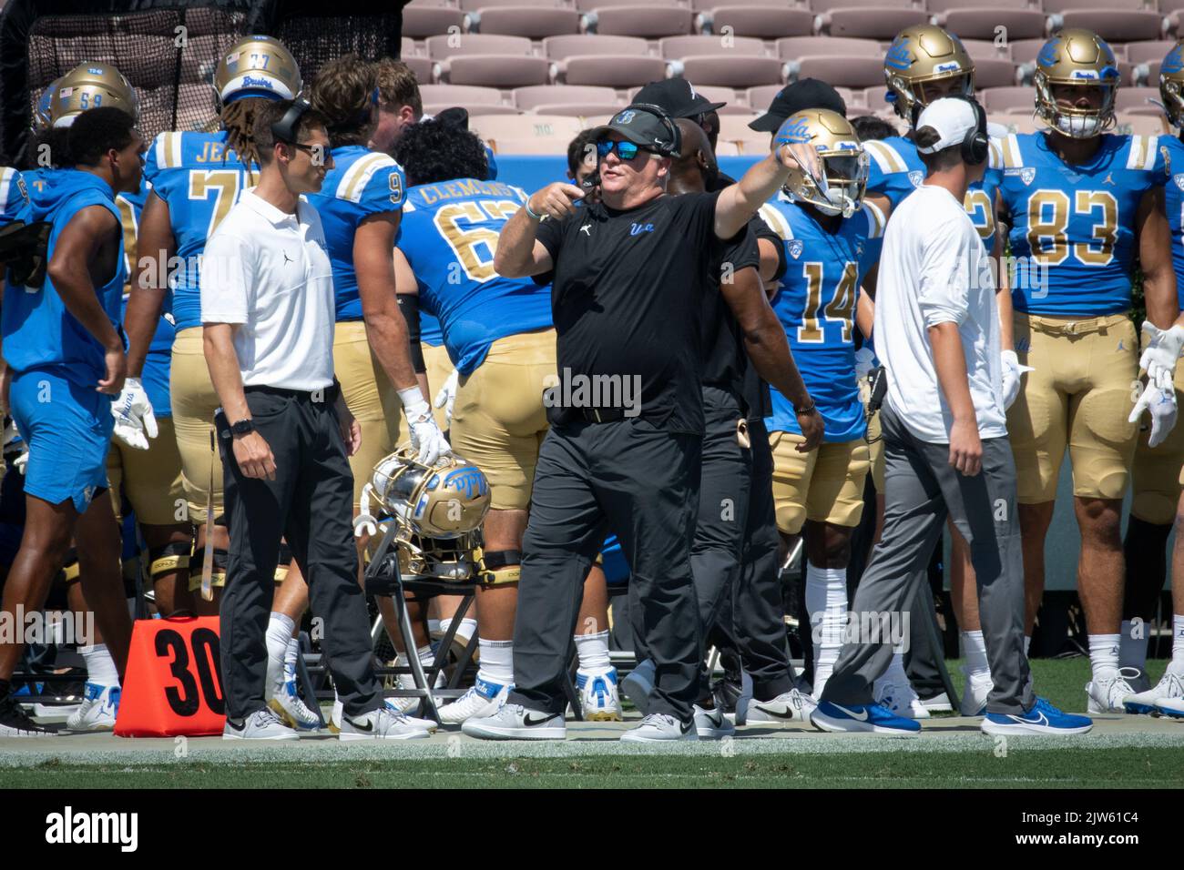 UCLA Bruins head coach Chip Kelly directs during a NCAA Football game ...