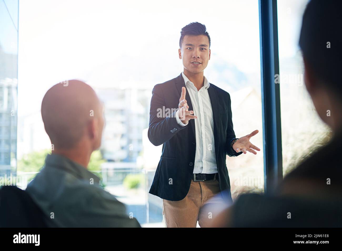 Business people coming sitting hi-res stock photography and images - Alamy