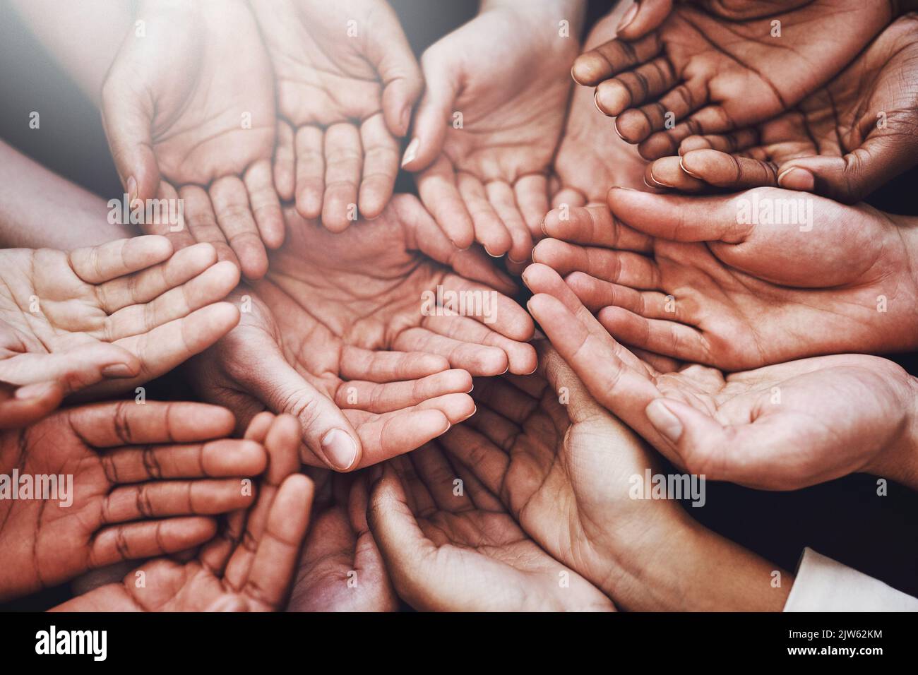 Help those in need. a group of hands held cupped out together Stock ...