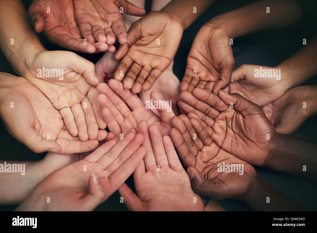 Let your hands do the talking. High angle shot of a group of ...