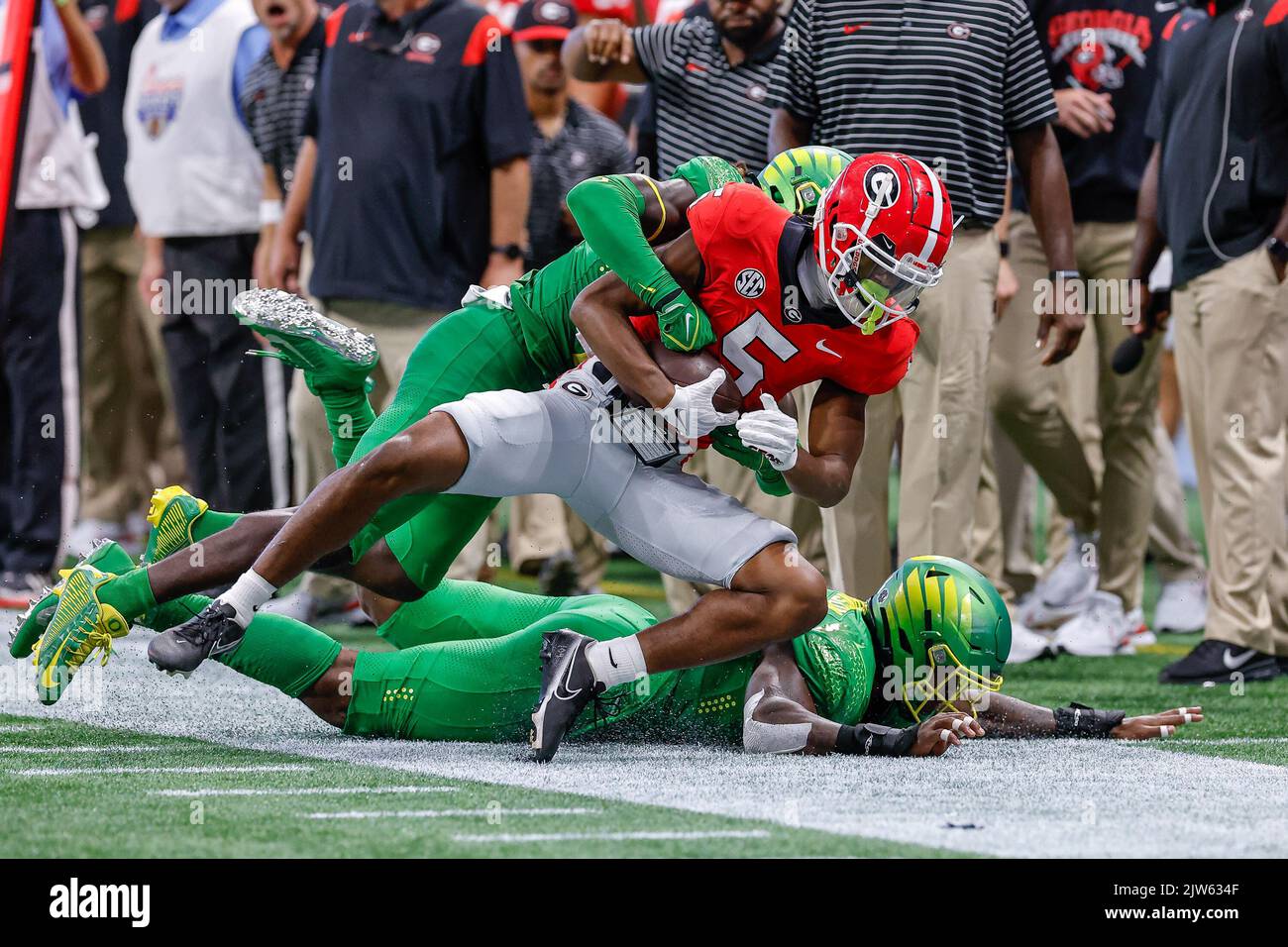 Atlanta, Georgia. 3rd Sep, 2022. Georgia's Adonai Mitchell (5) is taken ...