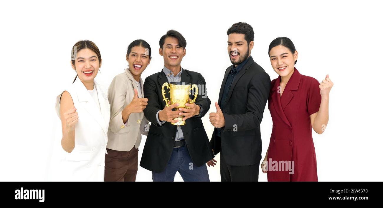 Team of successful young people standing together with trophy received ...