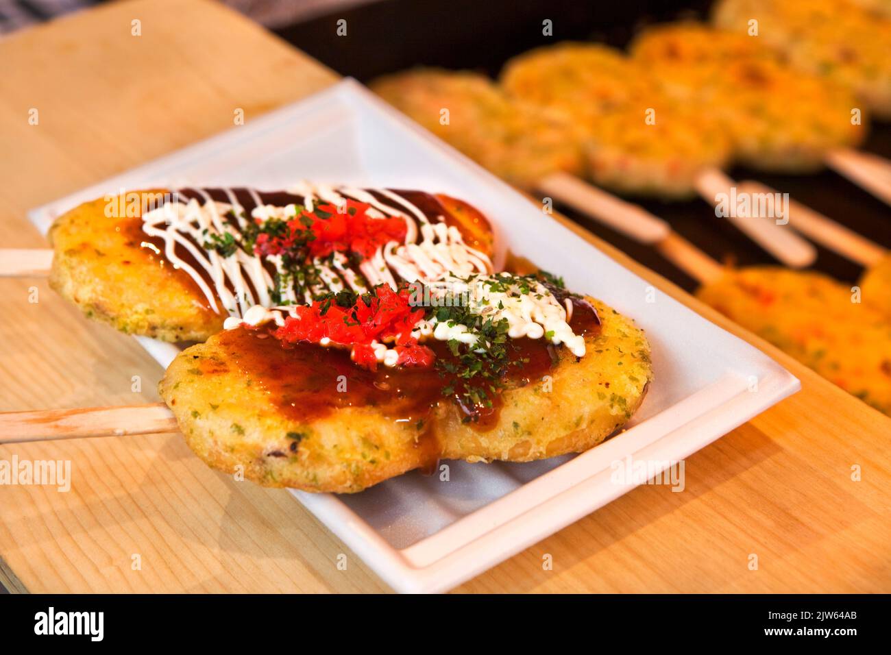 Okonomiyaki grilled variety pancake hi-res stock photography and images ...