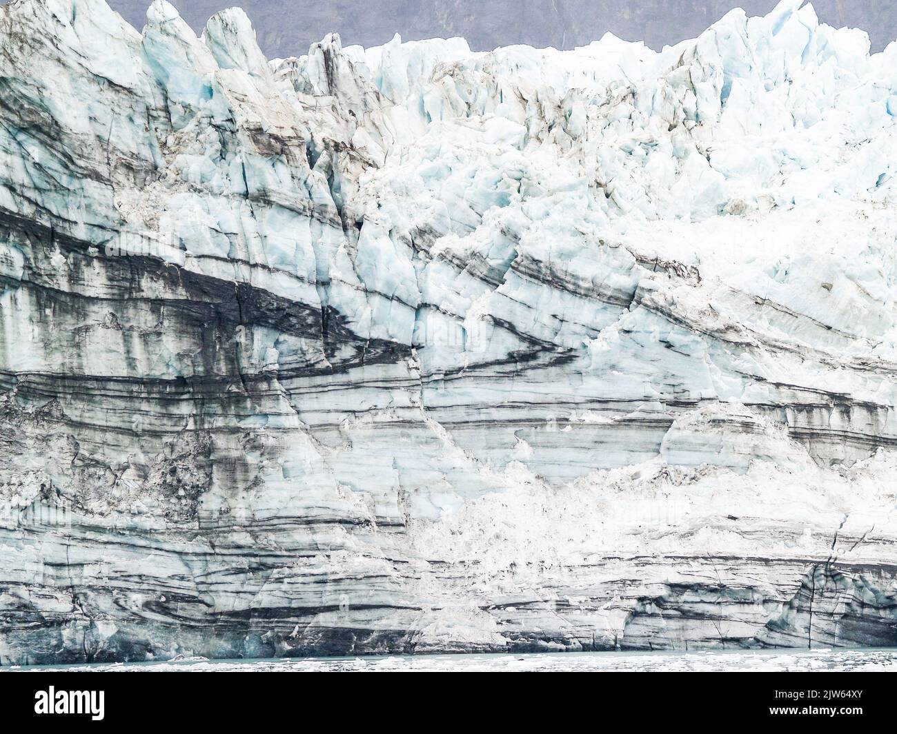 Glacial ice flows showing the characteristic black lines and patterns ...