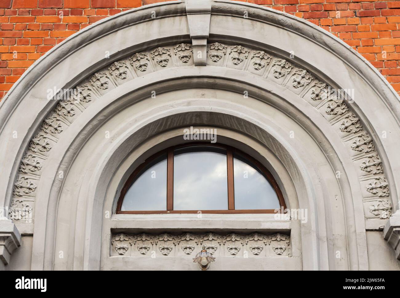 Architectural fragment of facade. Gorgeous ornate stone fretwork of old ...