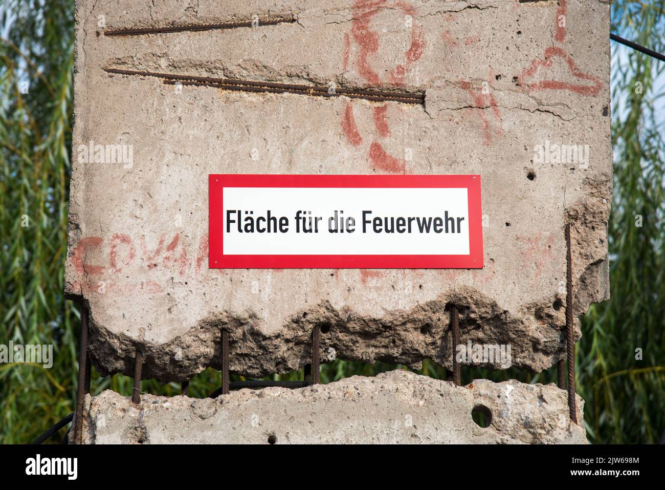 Sign area for the fire brigade in German on a porous surface Stock ...