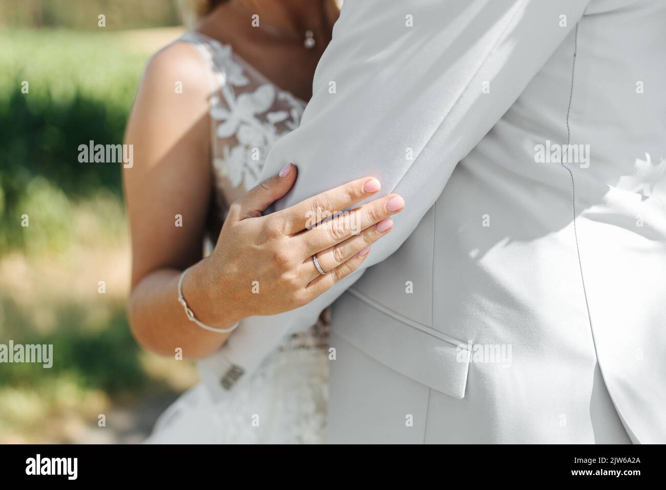 Grooms arm hi-res stock photography and images - Alamy