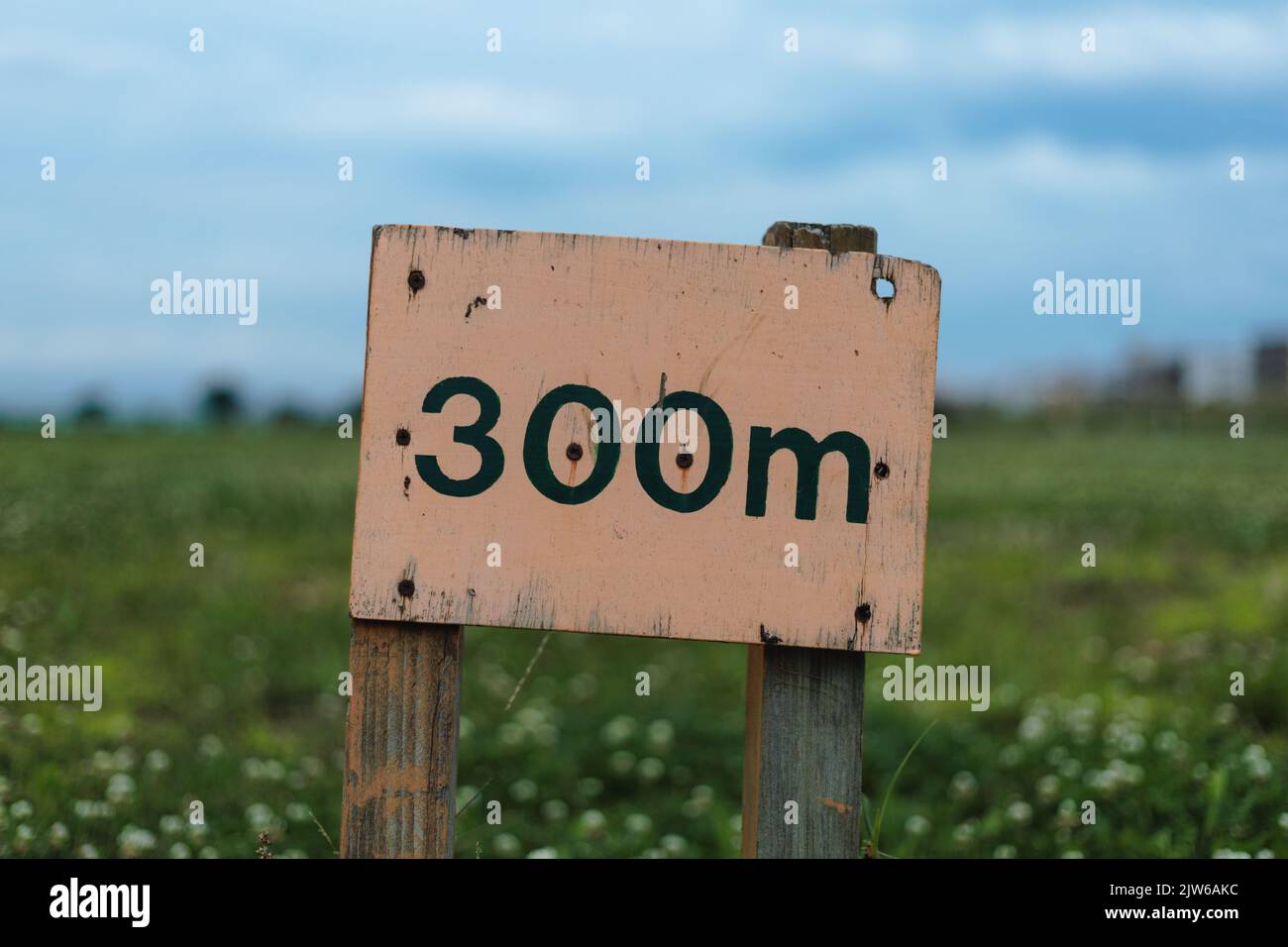 A 300 mile sign on the street Stock Photo - Alamy