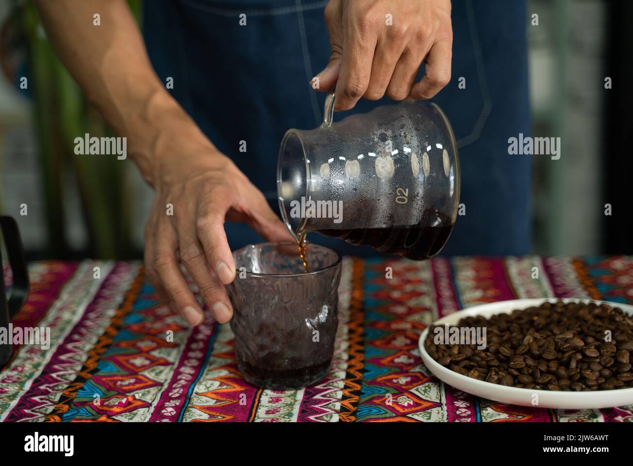 A man is making coffee Stock Photo - Alamy