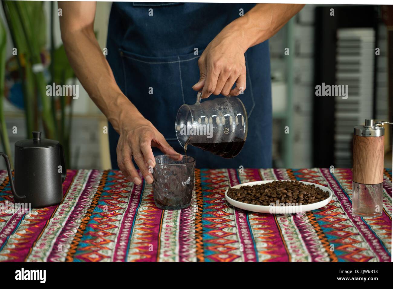 A man is making coffee Stock Photo - Alamy