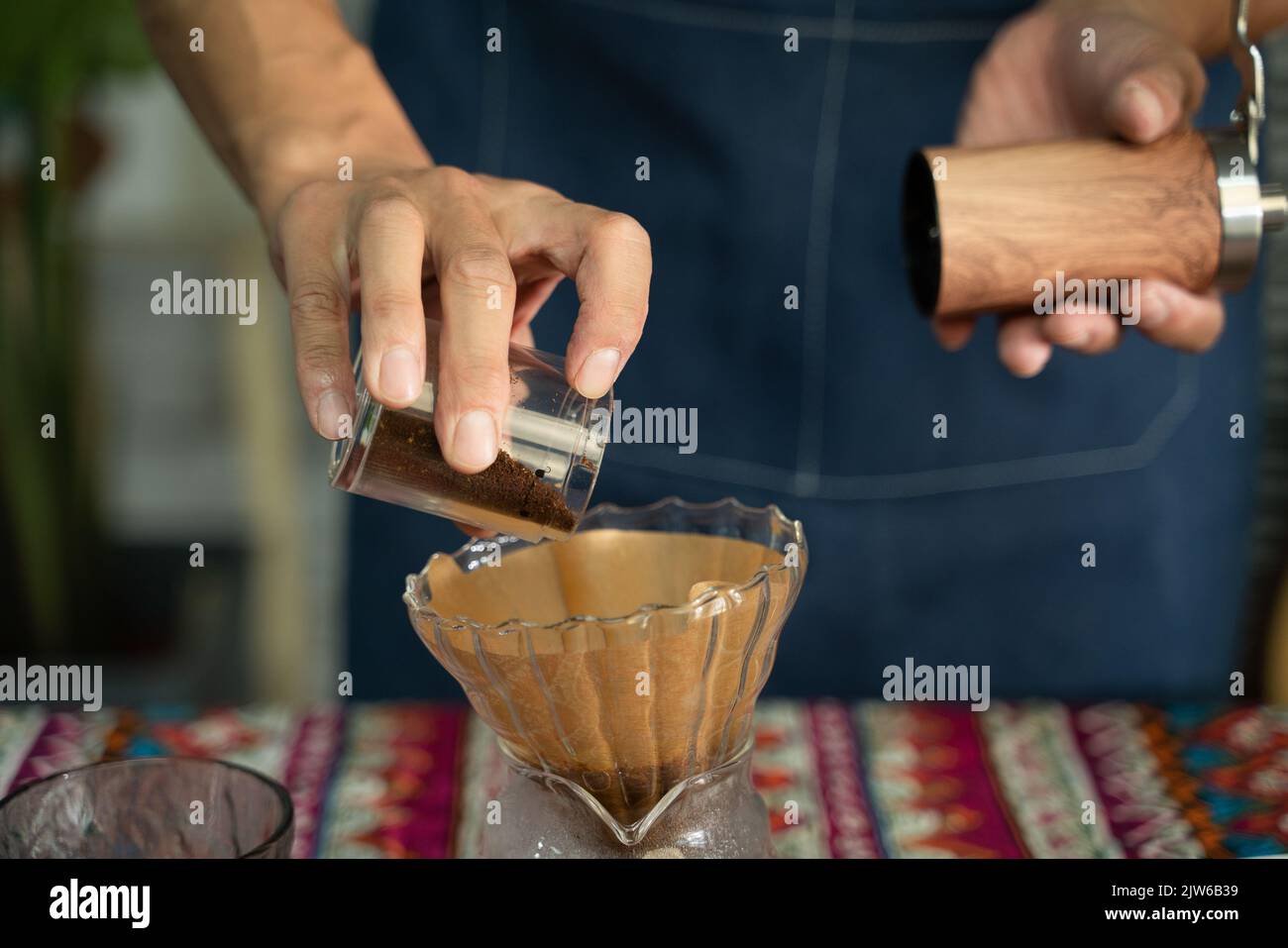A man is making coffee Stock Photo - Alamy