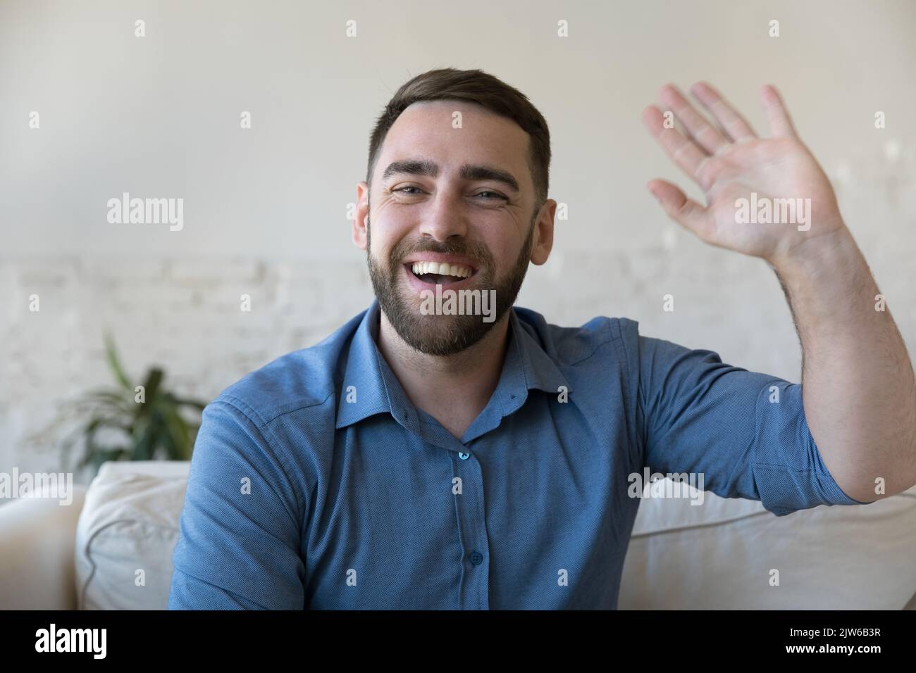 Headshot portrait smiling man make video call at home Stock Photo - Alamy