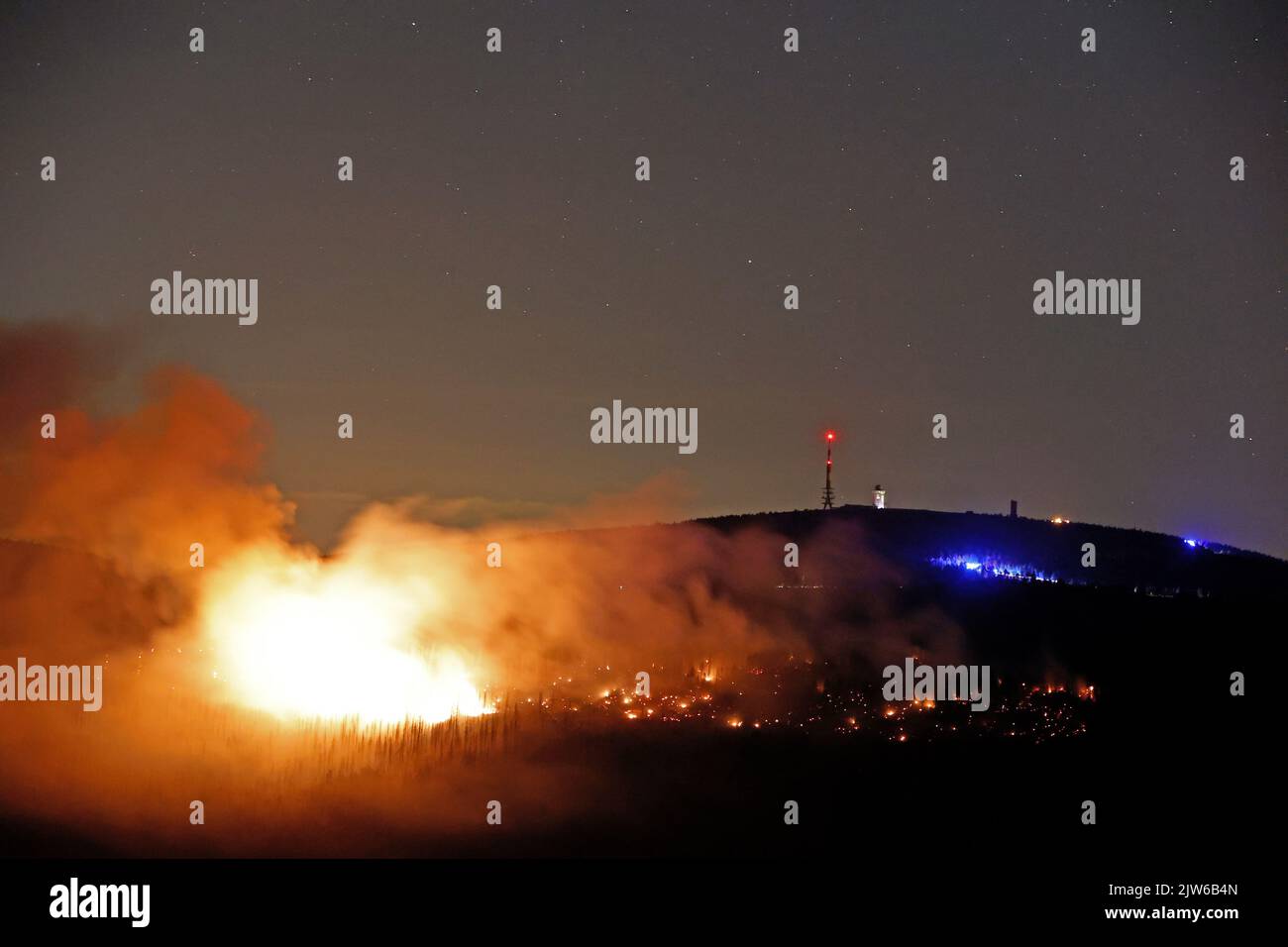 Schierke, Germany. 04th Sep, 2022. Early in the morning, flames blaze ...