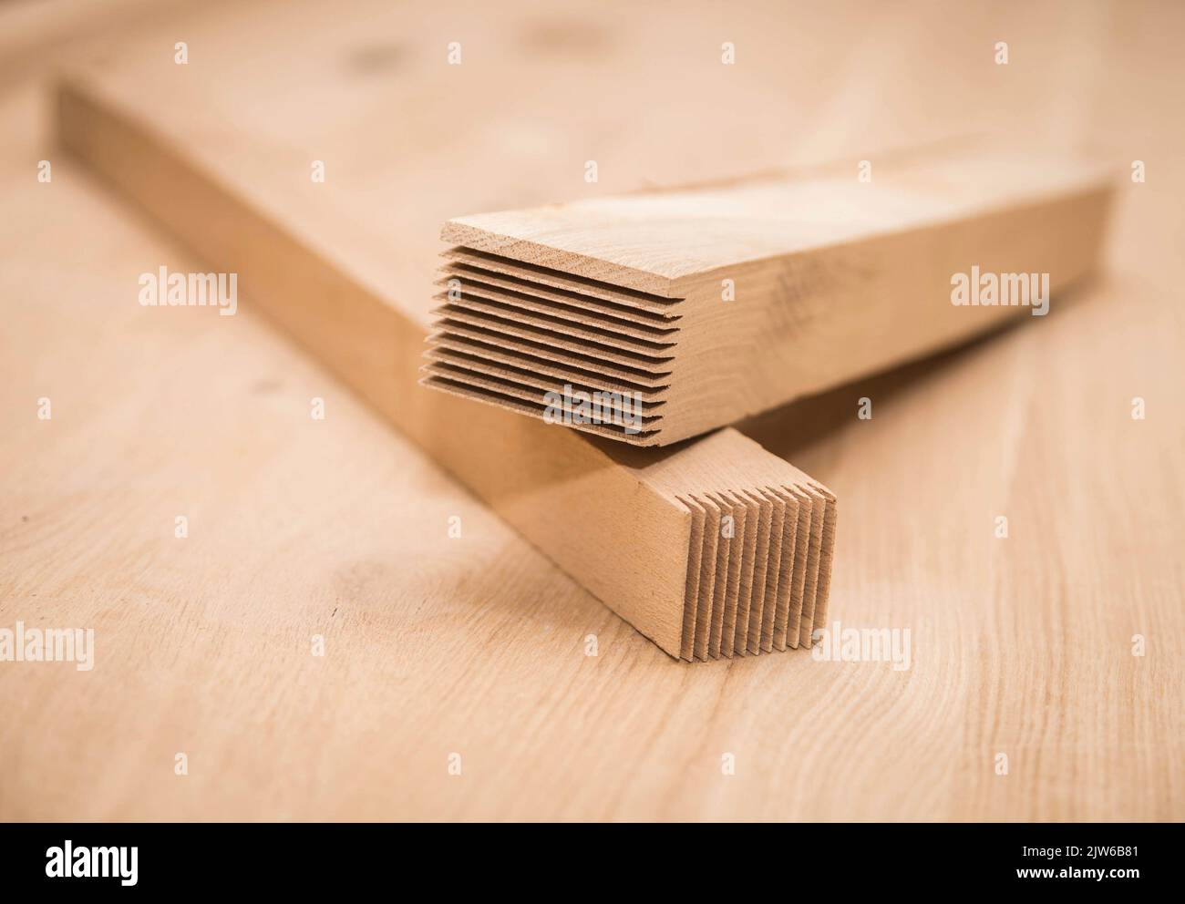 two bars that will be glued together to make a wooden shield Stock ...