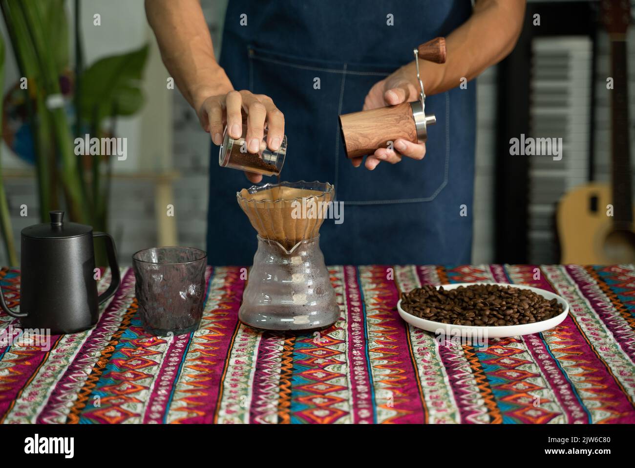 A man is making coffee Stock Photo - Alamy