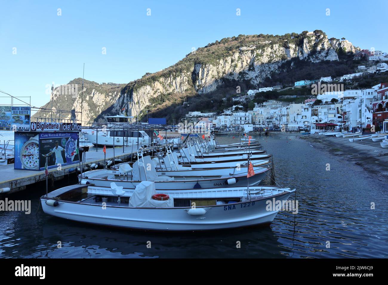 Capri - Barche al porto di Marina Grande al tramonto Stock Photo - Alamy