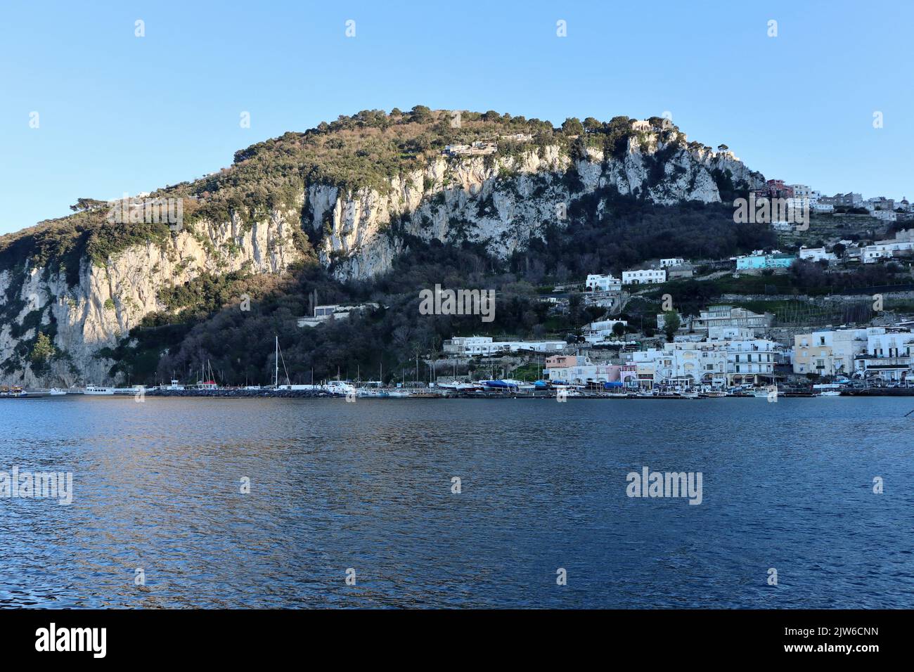 Capri - Monte Tiberio dal molo di imbarco al tramonto Stock Photo - Alamy