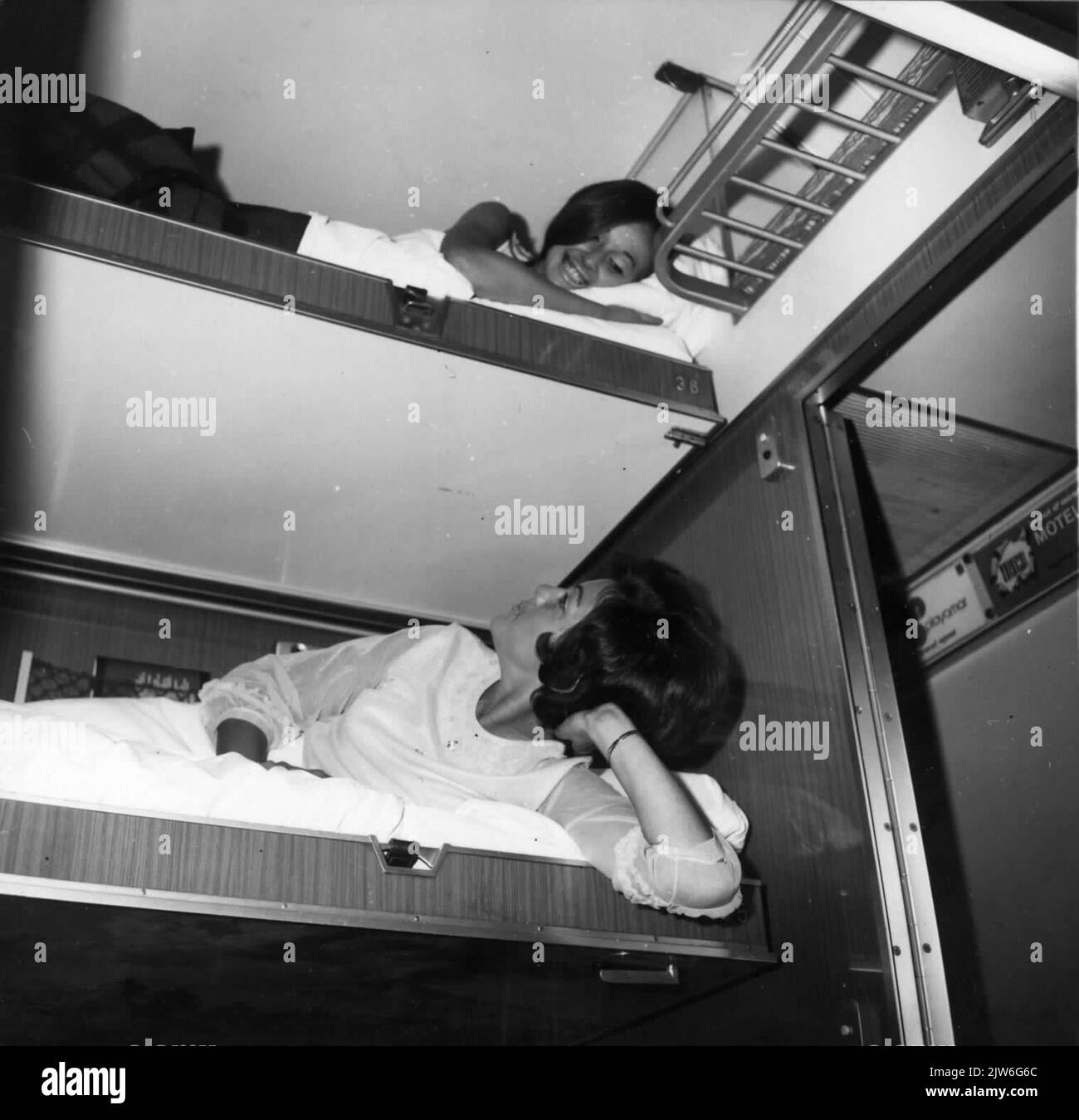 Image of travelers in the couchette of a lounger Stock Photo - Alamy