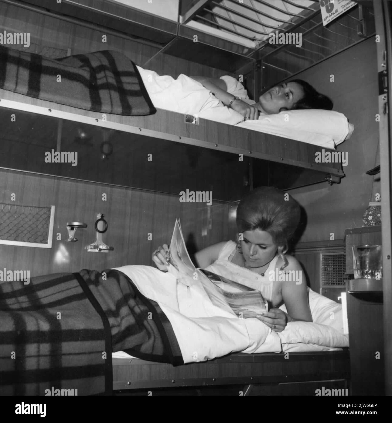 Image of travelers in the couchette of a lounger Stock Photo - Alamy