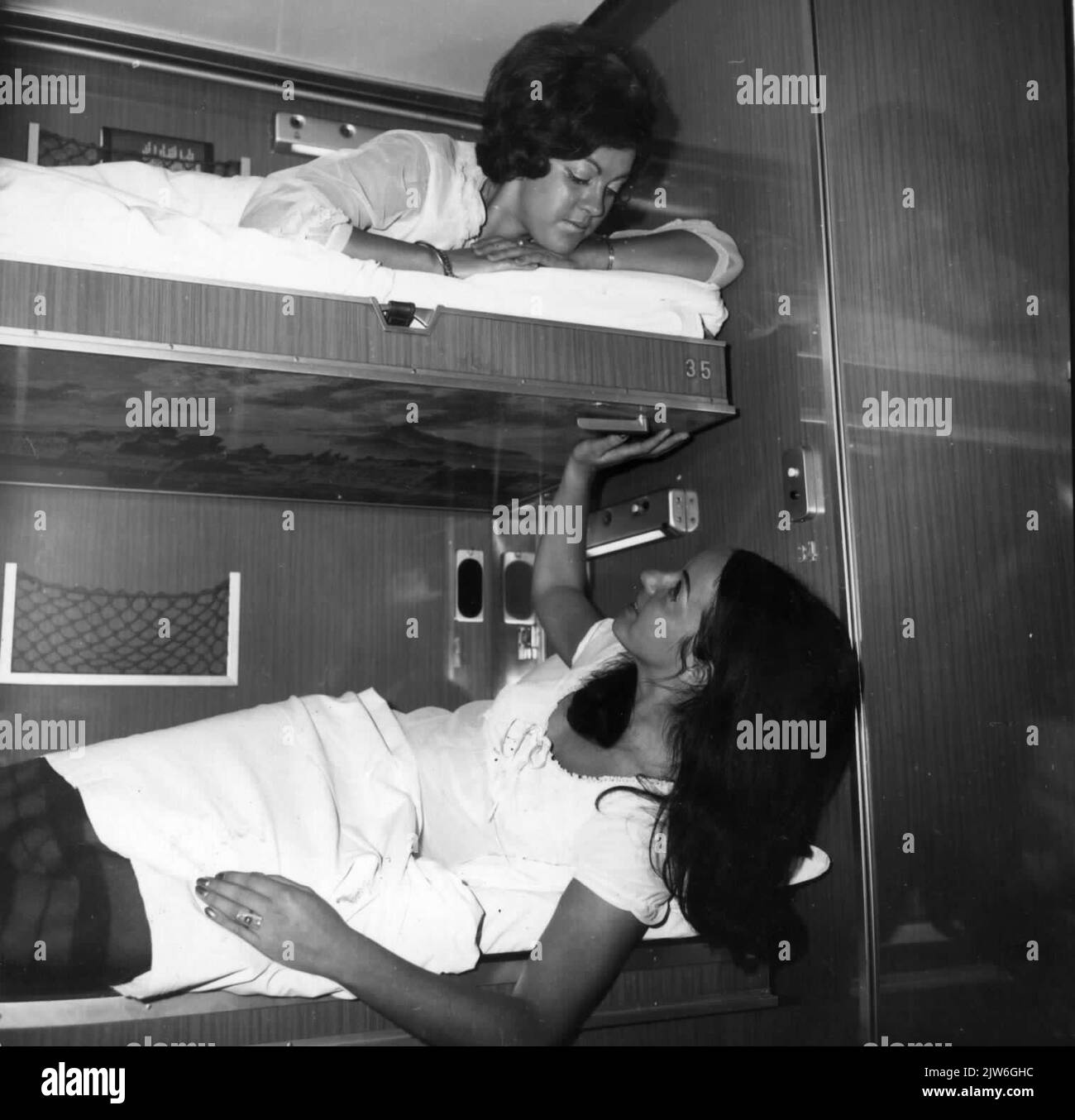 Image of travelers in the couchette of a lounger Stock Photo - Alamy