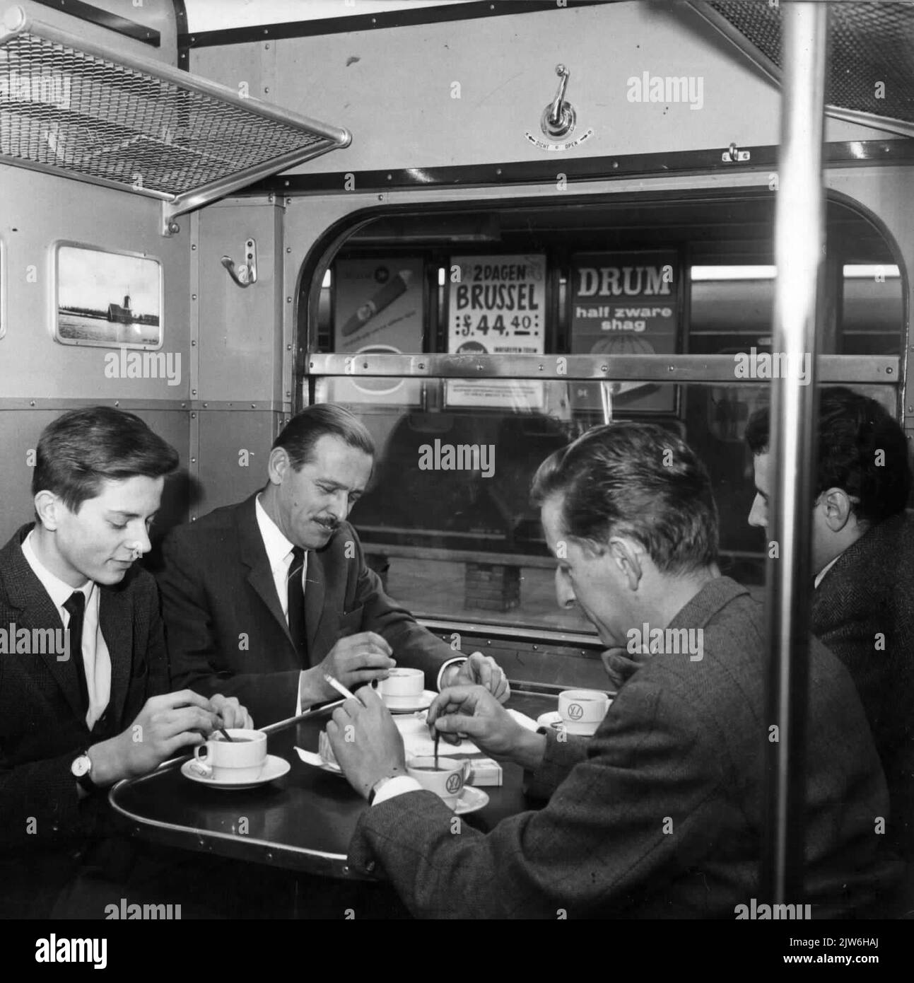 View of the city wall with deciduous trees and a bleacher with drying ...