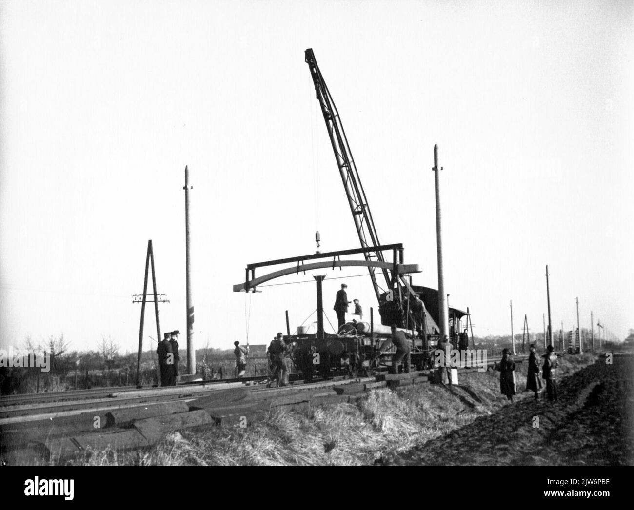 Image of placing a concrete overhead leader's portal along the railway ...