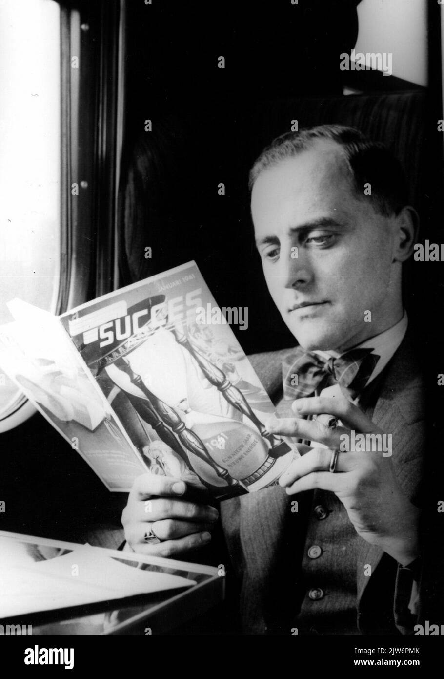 Image of a reading man in a train compartment (publicity photo Stock ...
