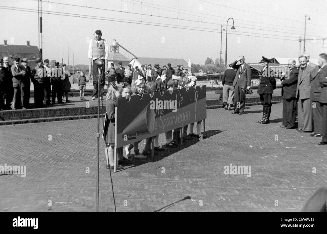 Image of the festive reception of the guests by a group of children and ...