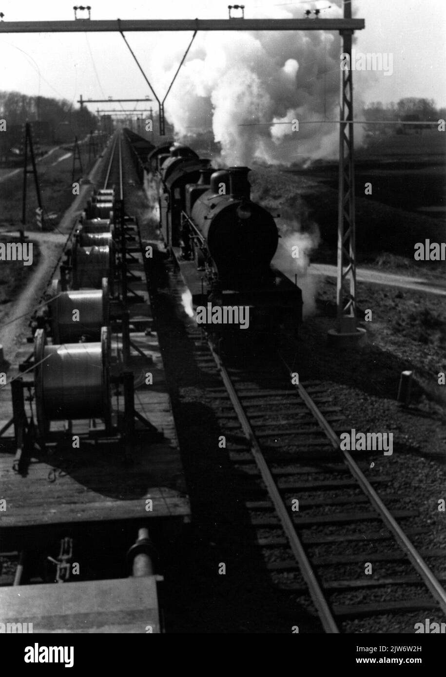 Image of a freight train drawn by two steam locomotives from the series ...
