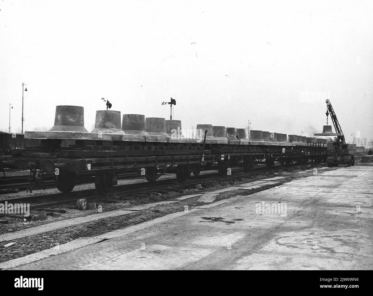 Image of the loading of freight wagons with concrete foundation blocks ...