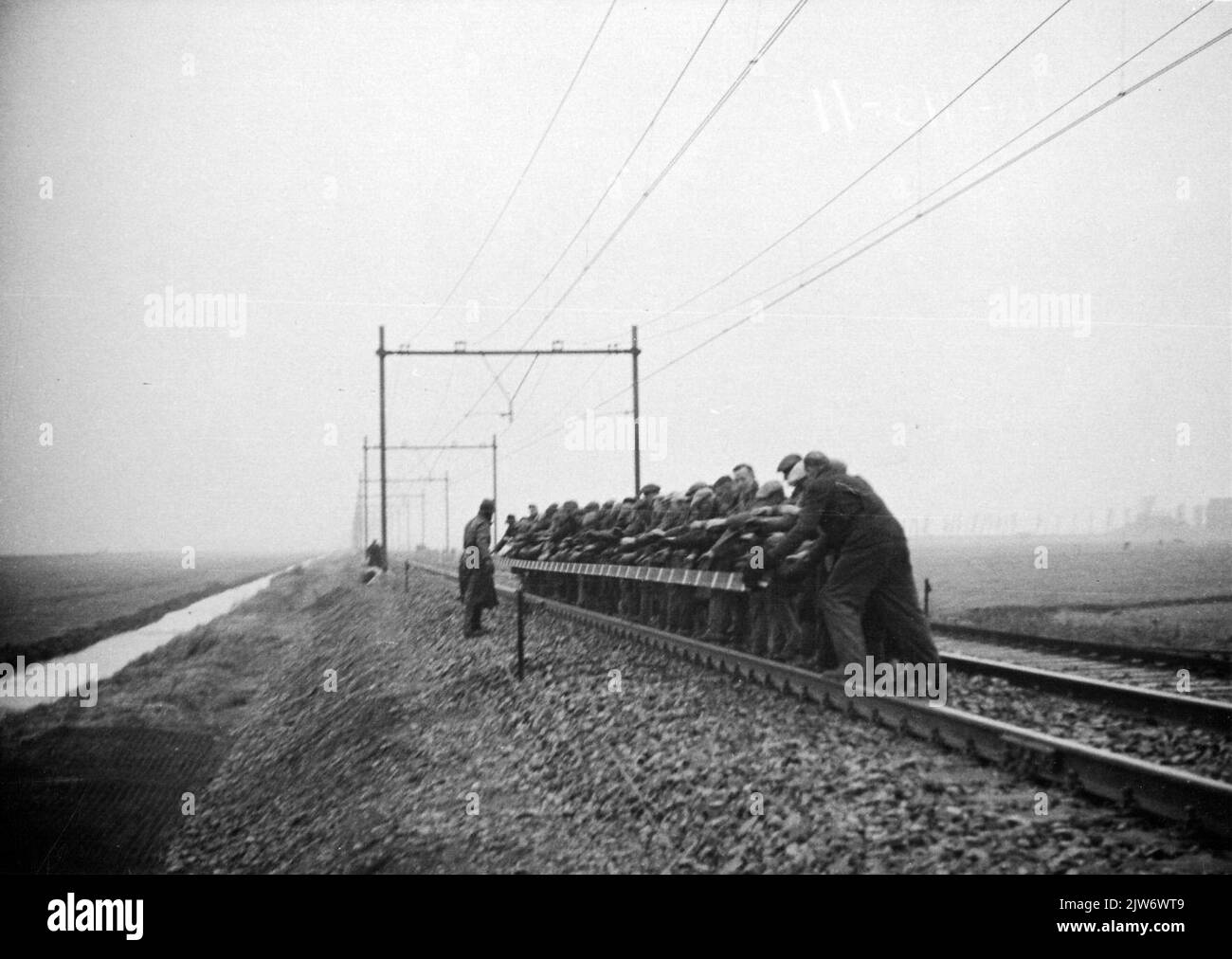 Team of road workers Black and White Stock Photos & Images - Alamy