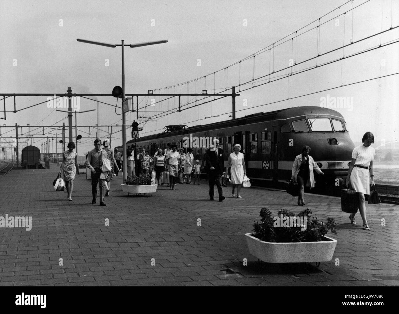 Image of travelers on the platform of the N.S station Leiden in Leiden ...
