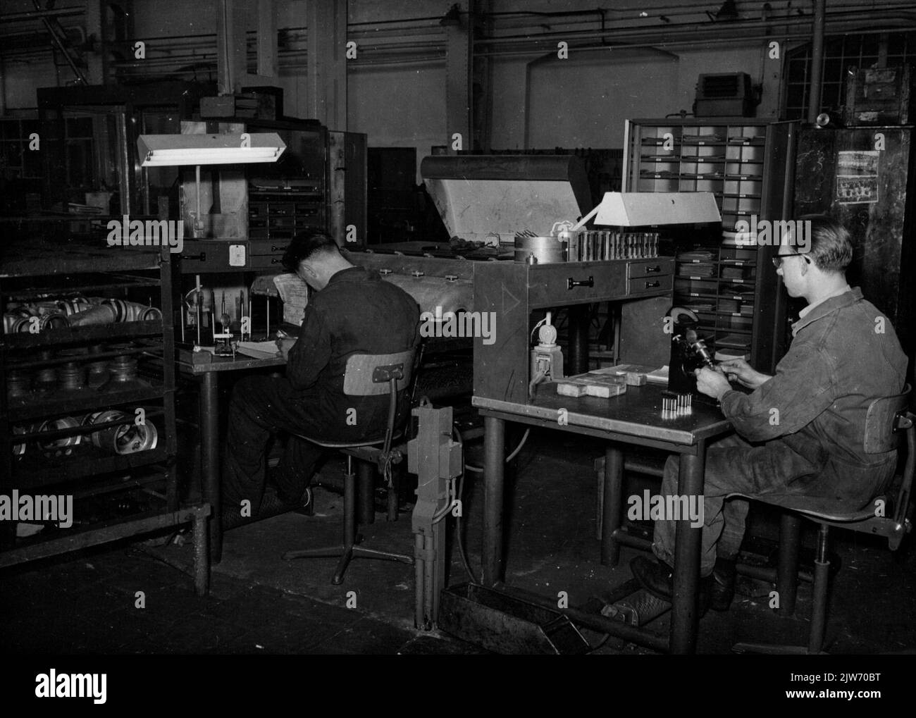 Image of two engineers in the main workshop of the N.S. in Tilburg ...