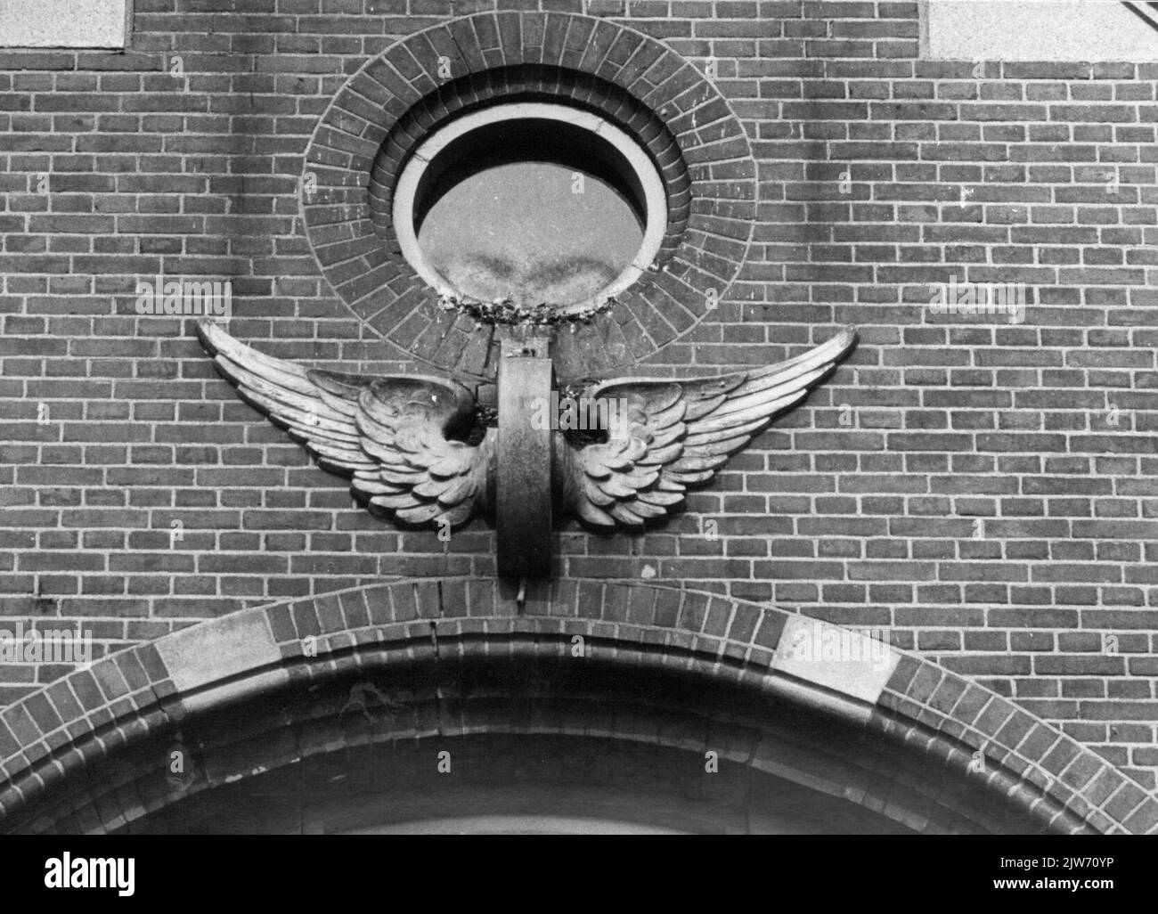 Image of a winged wheel in the facade of the N.S. station Roosendaal in ...