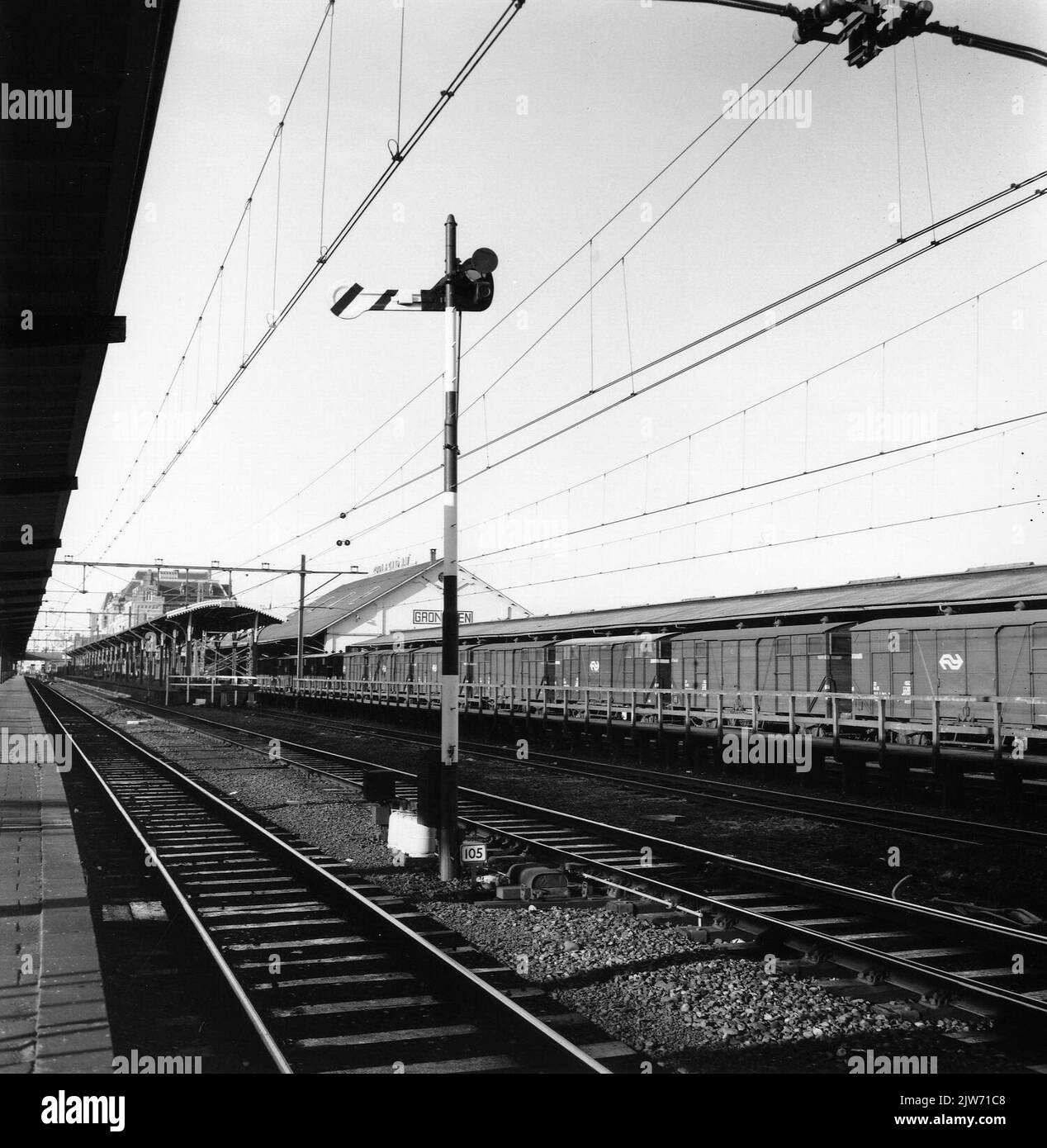 Image of an arm signal along one of the platform tracks of the N.S ...