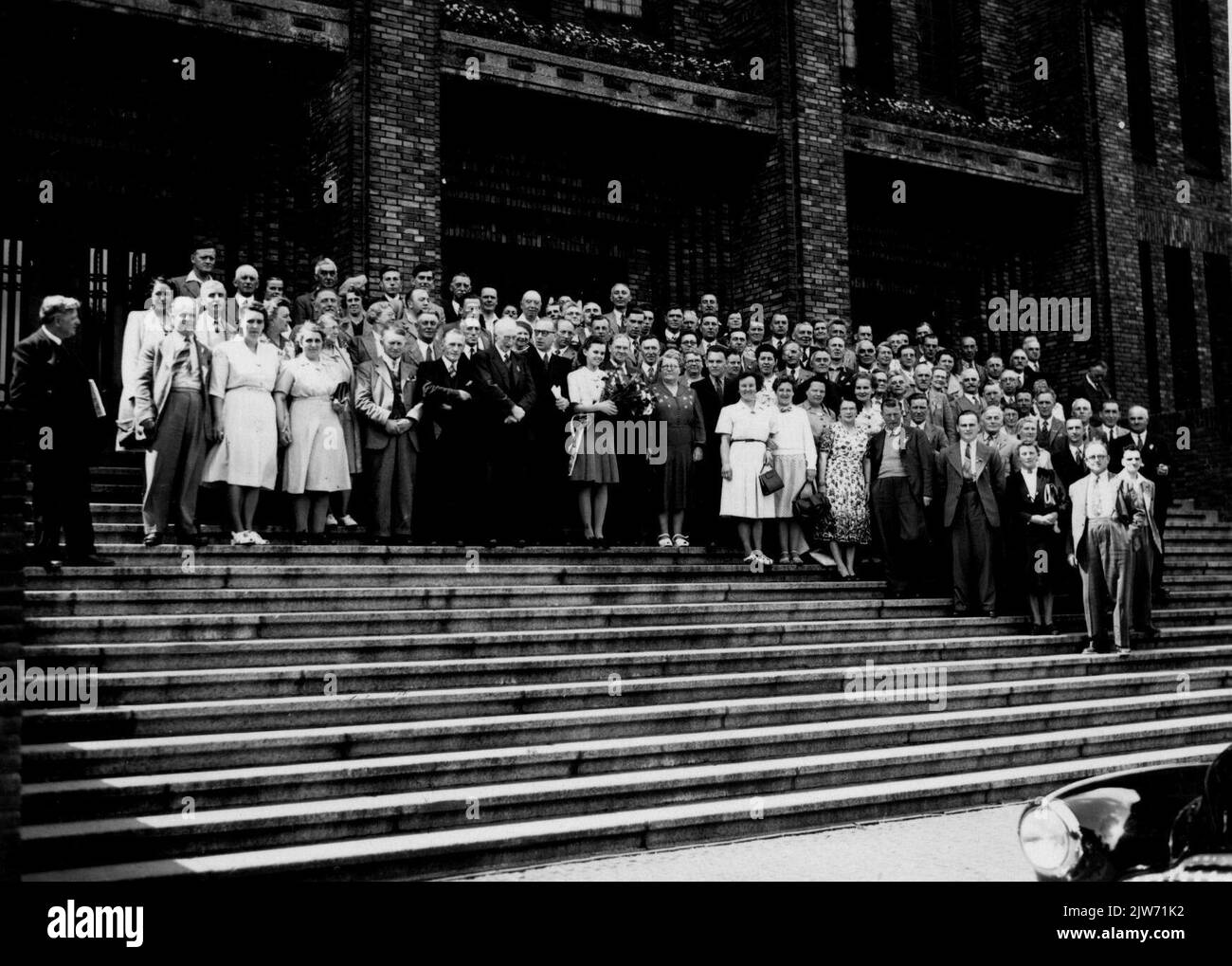 Group portrait on the landing strap of the 3rd administration building ...