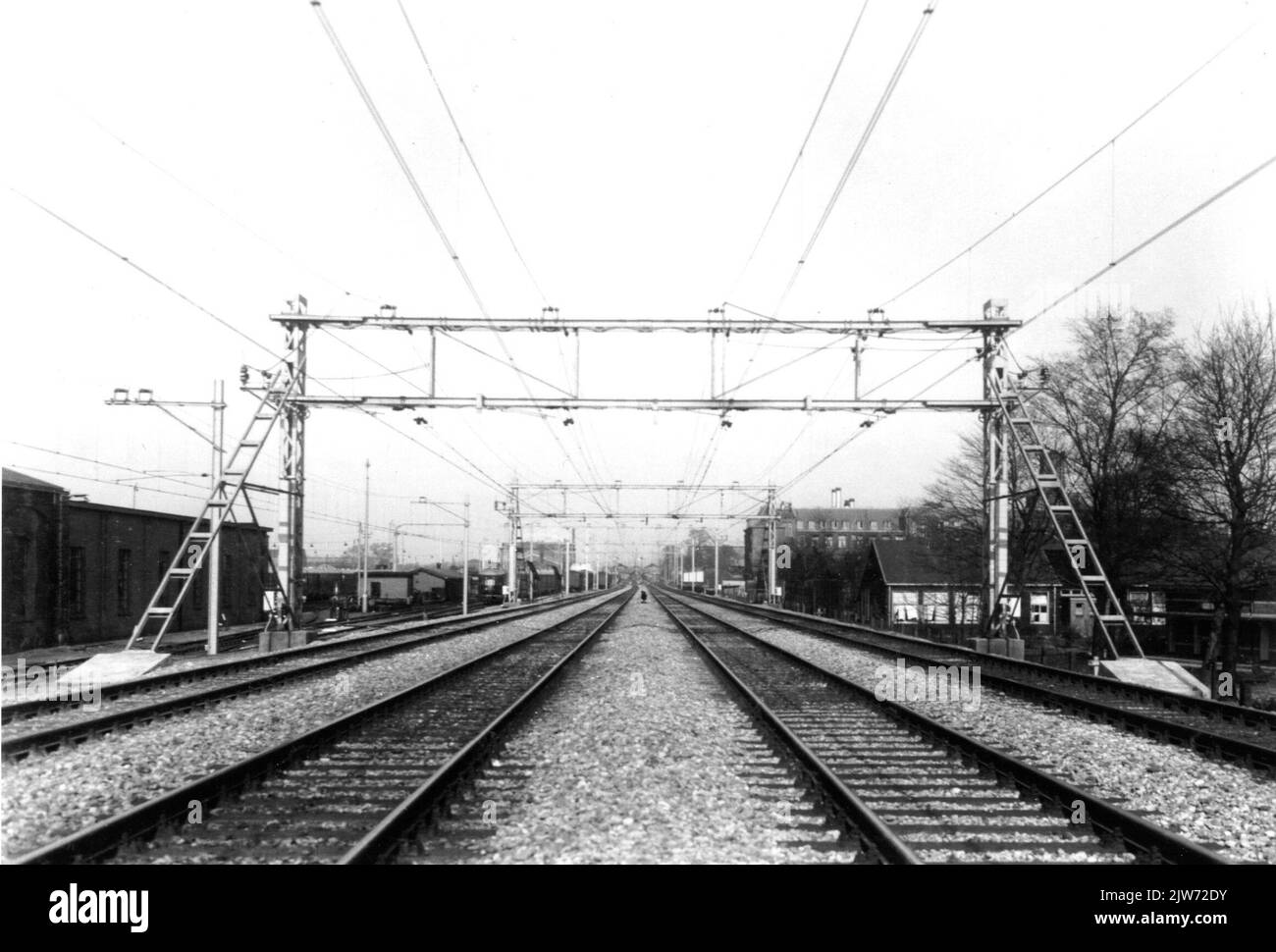 Image of a driver in the cabin (steering position) of an electric train ...