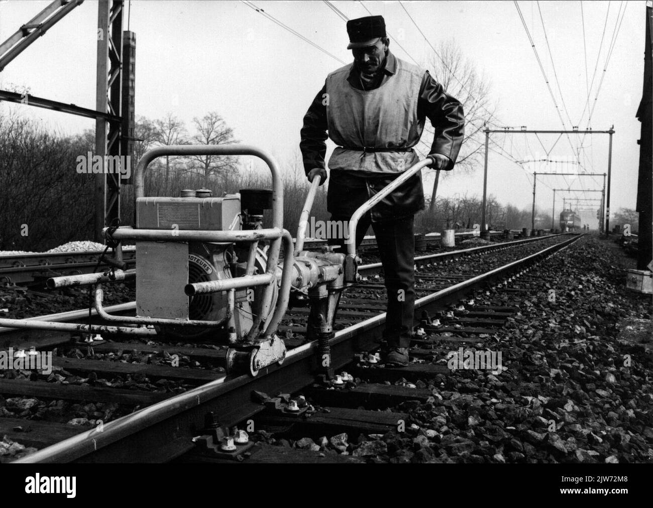 Image of a road worker from N.S. With a collar screw machine Stock ...