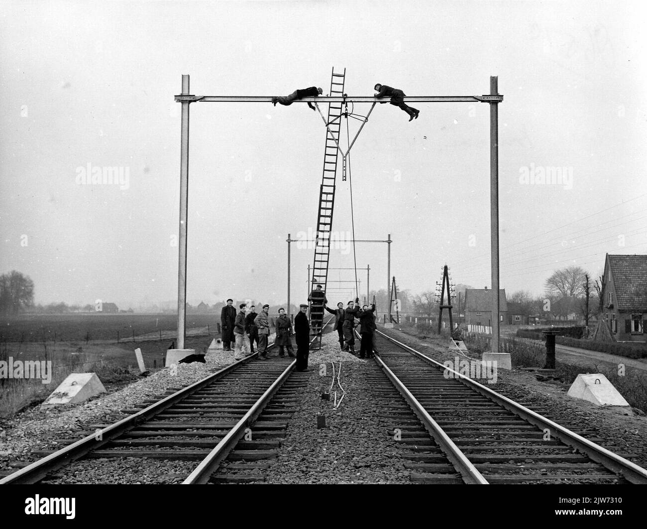 Image of placing an overhead line portal for the electrification of the ...