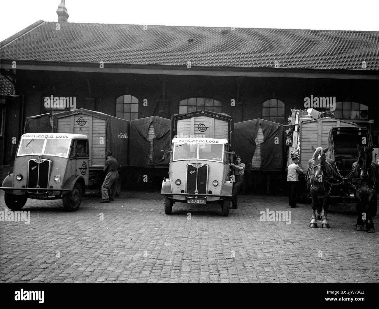 Two trucks Black and White Stock Photos & Images - Alamy