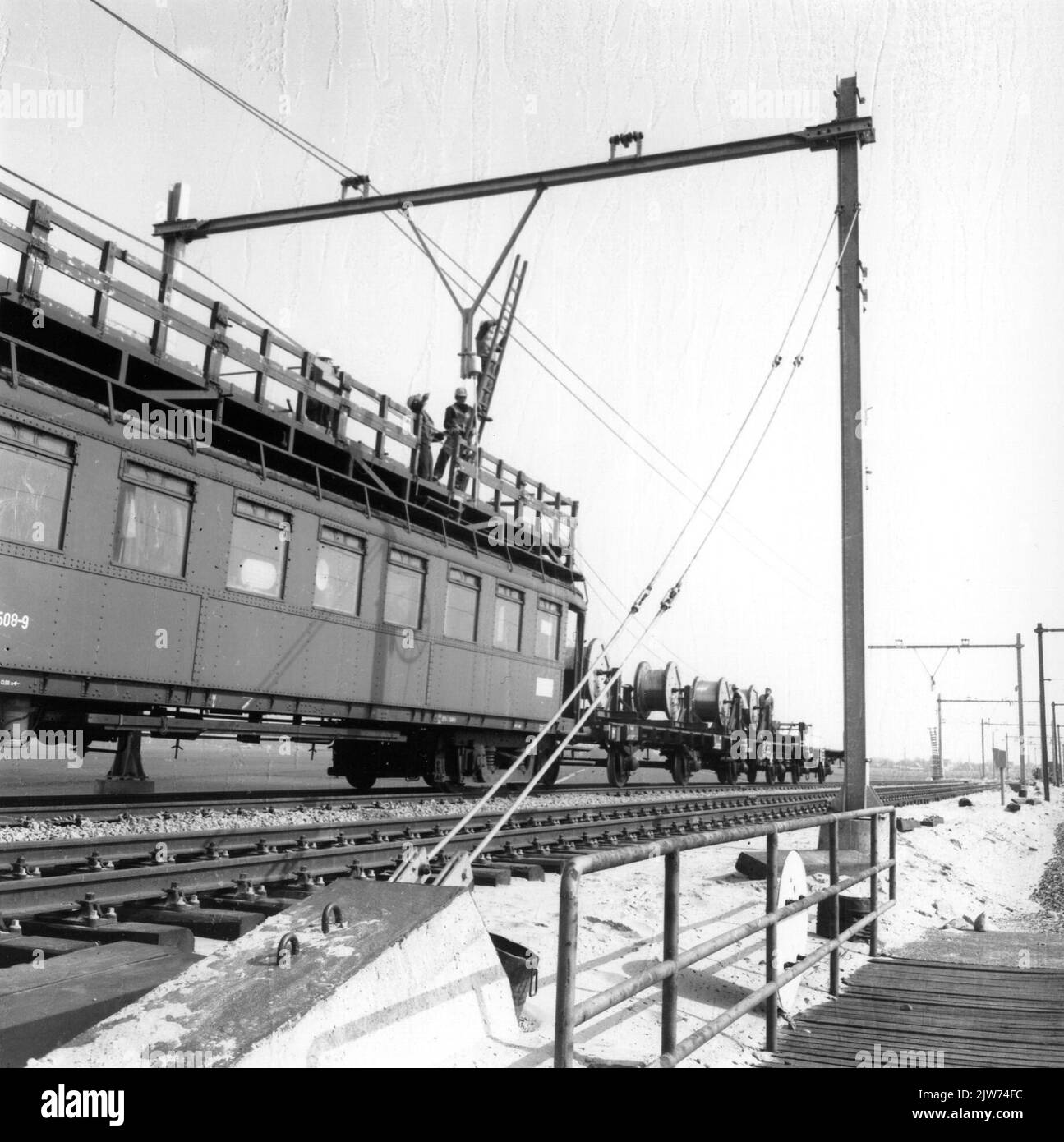Image of applying the overhead line above a railway line, using a ...