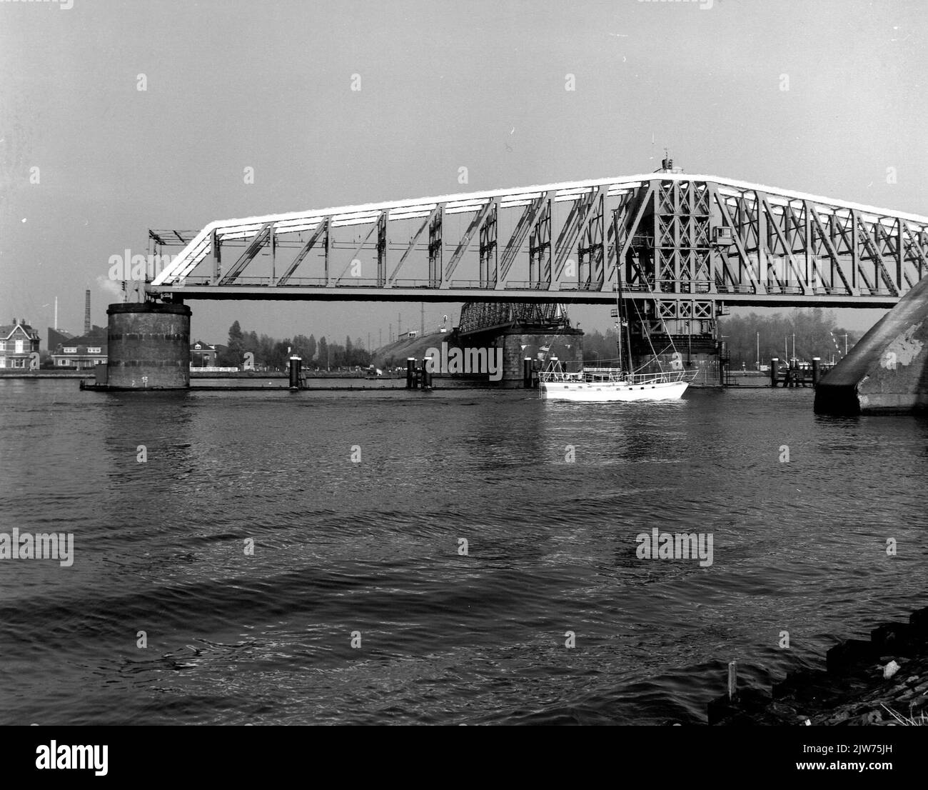 View of the opened railway bridge (Hembrug) over the North Sea Canal ...
