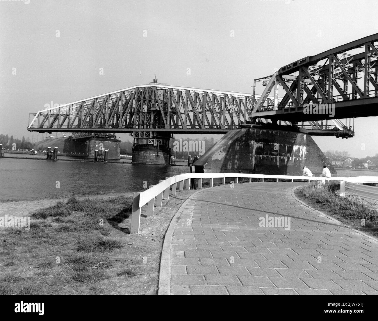 View of the opened railway bridge (Hembrug) over the North Sea Canal ...