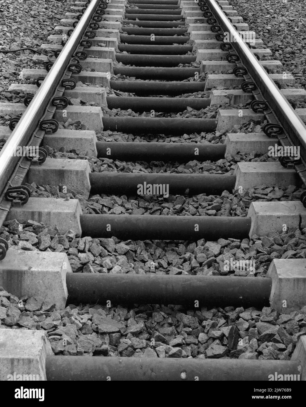 Image of a railway line with concrete sleepers Stock Photo - Alamy