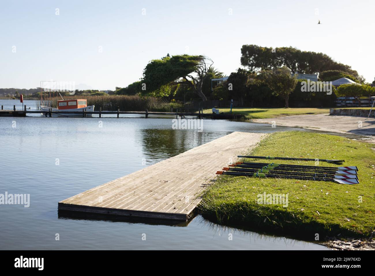 View of beautiful landscape of a lake and wooden dock Stock Photo - Alamy