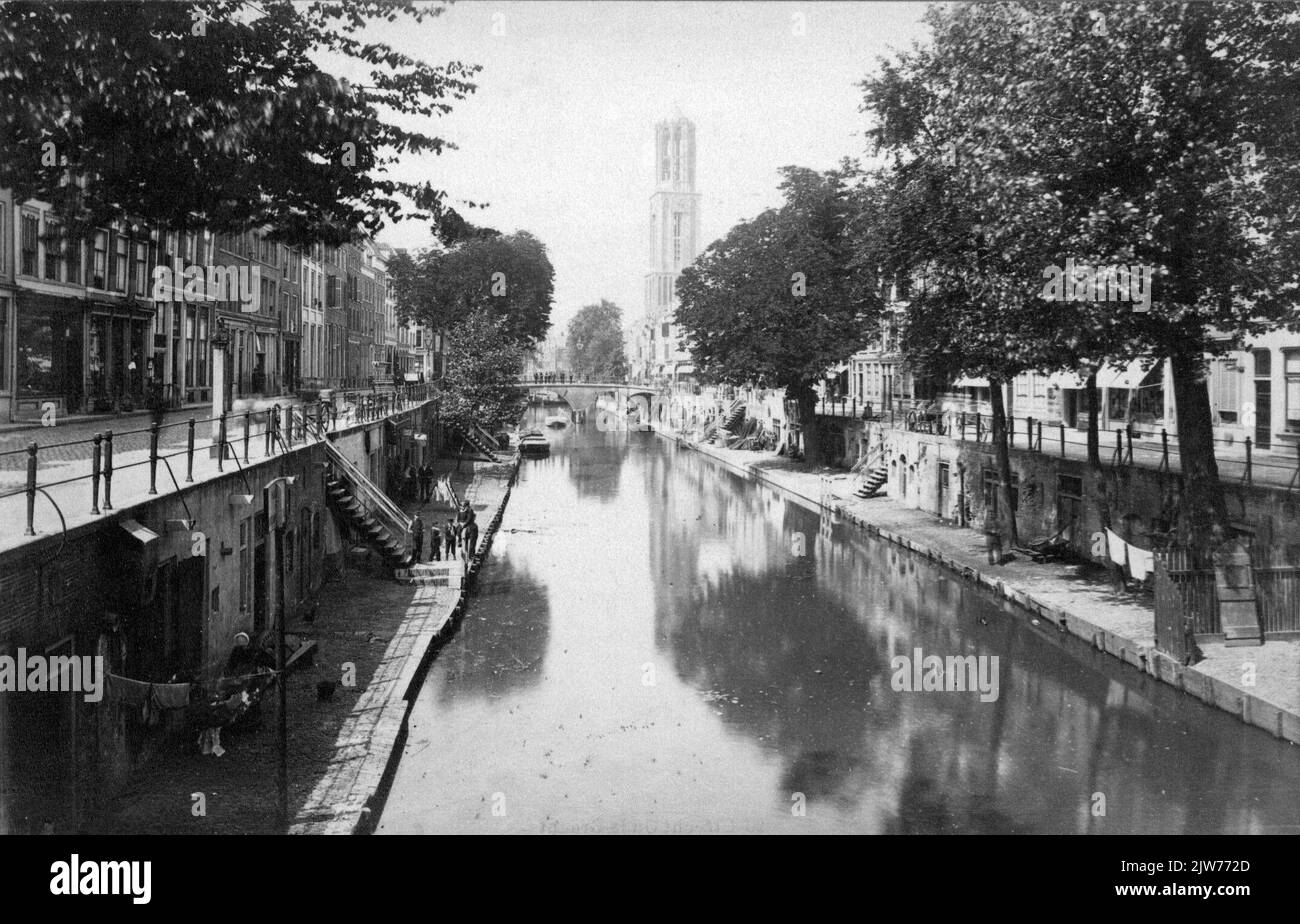 View of the Oudegracht and Hamburger Bridge in Utrecht, with the yard cellars on both sides and ...