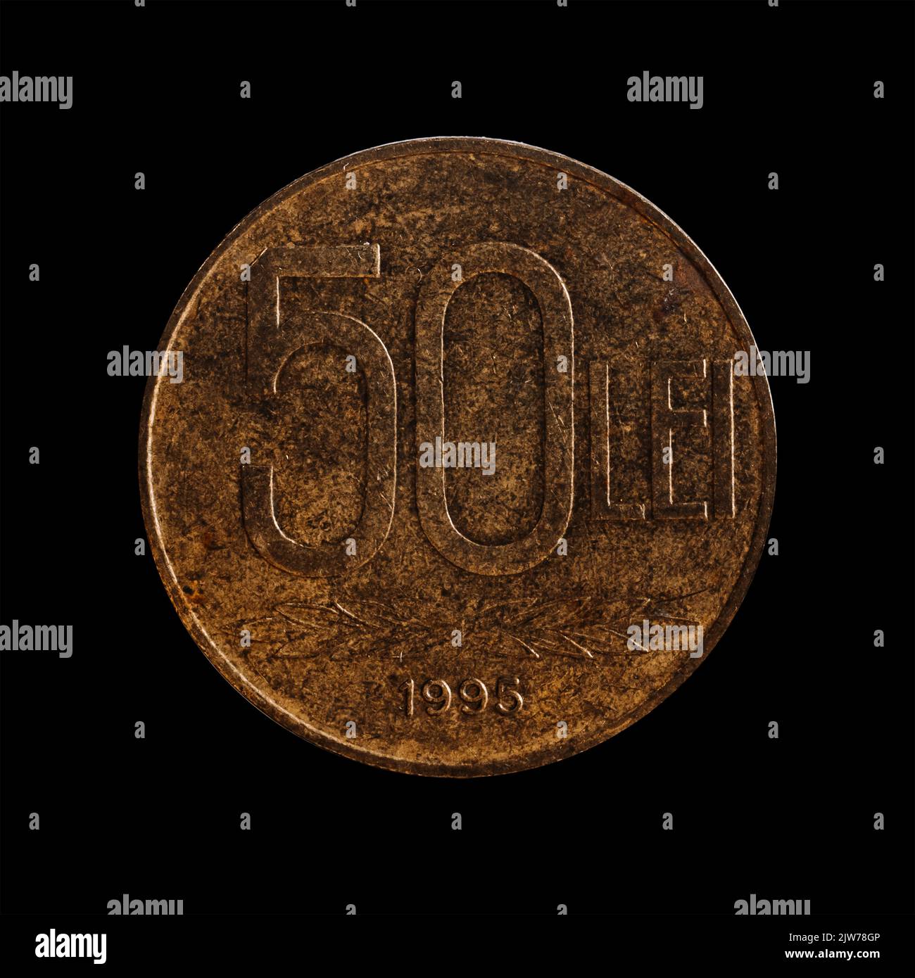 A closeup of a 50 lei coin from 1995 isolated on a black background ...